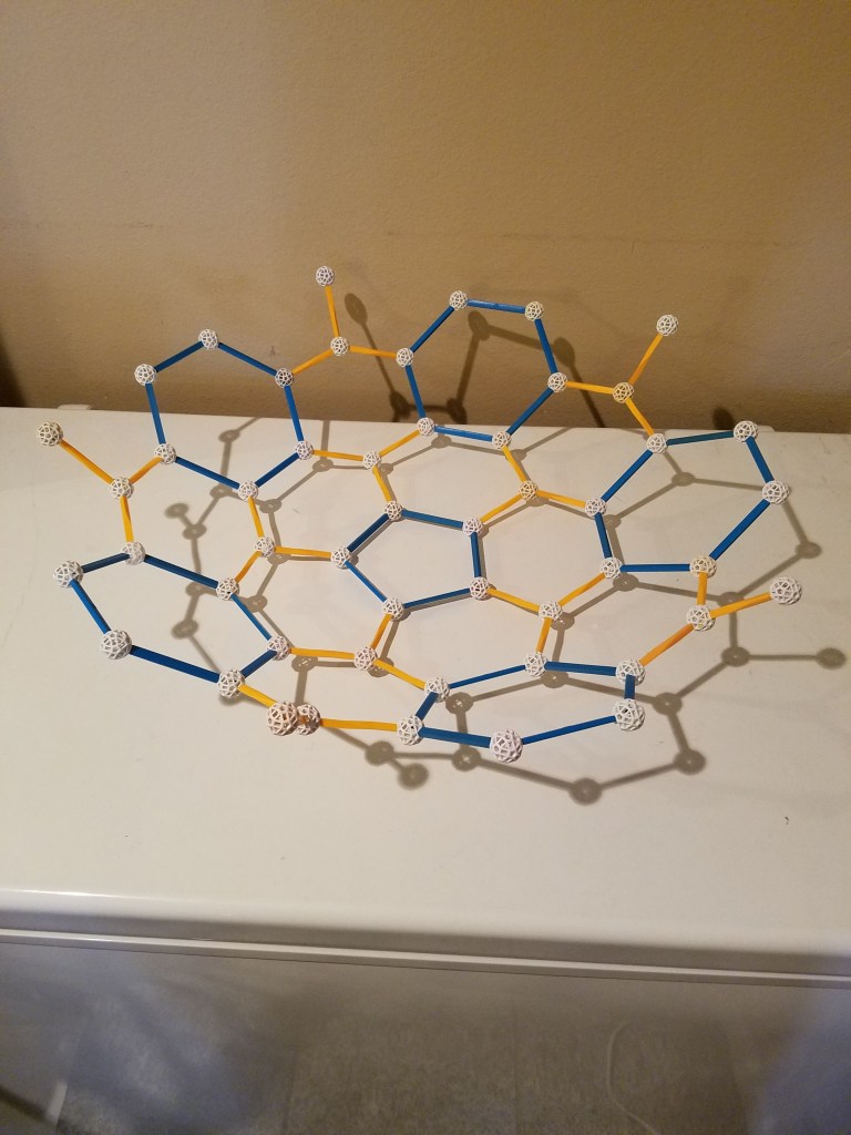 The Construction of a Zome Model of a 240-Atom Fullerene Molecule, In Seven Pictures ...